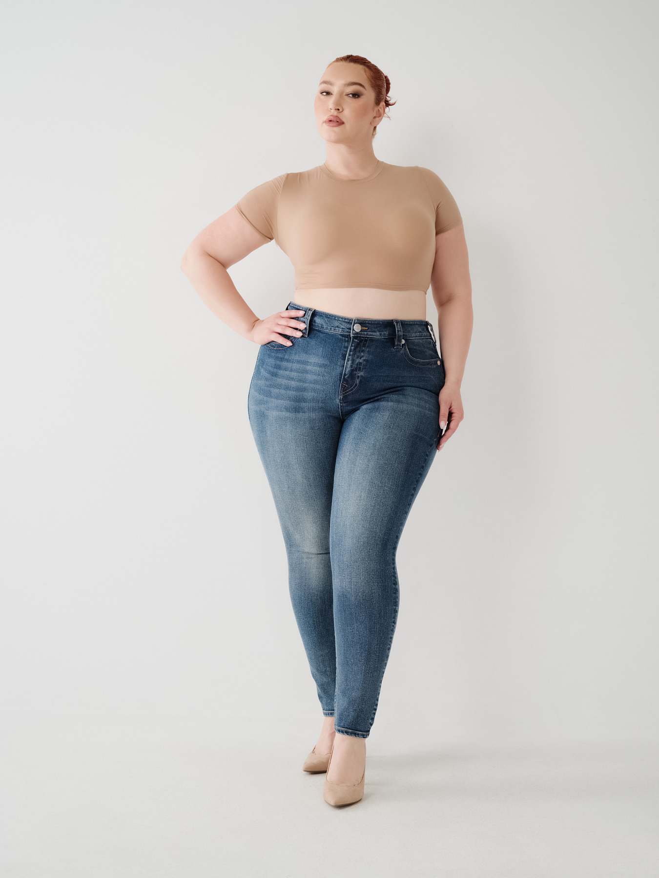 JENNIE MID RISE CURVY SKINNY JEAN