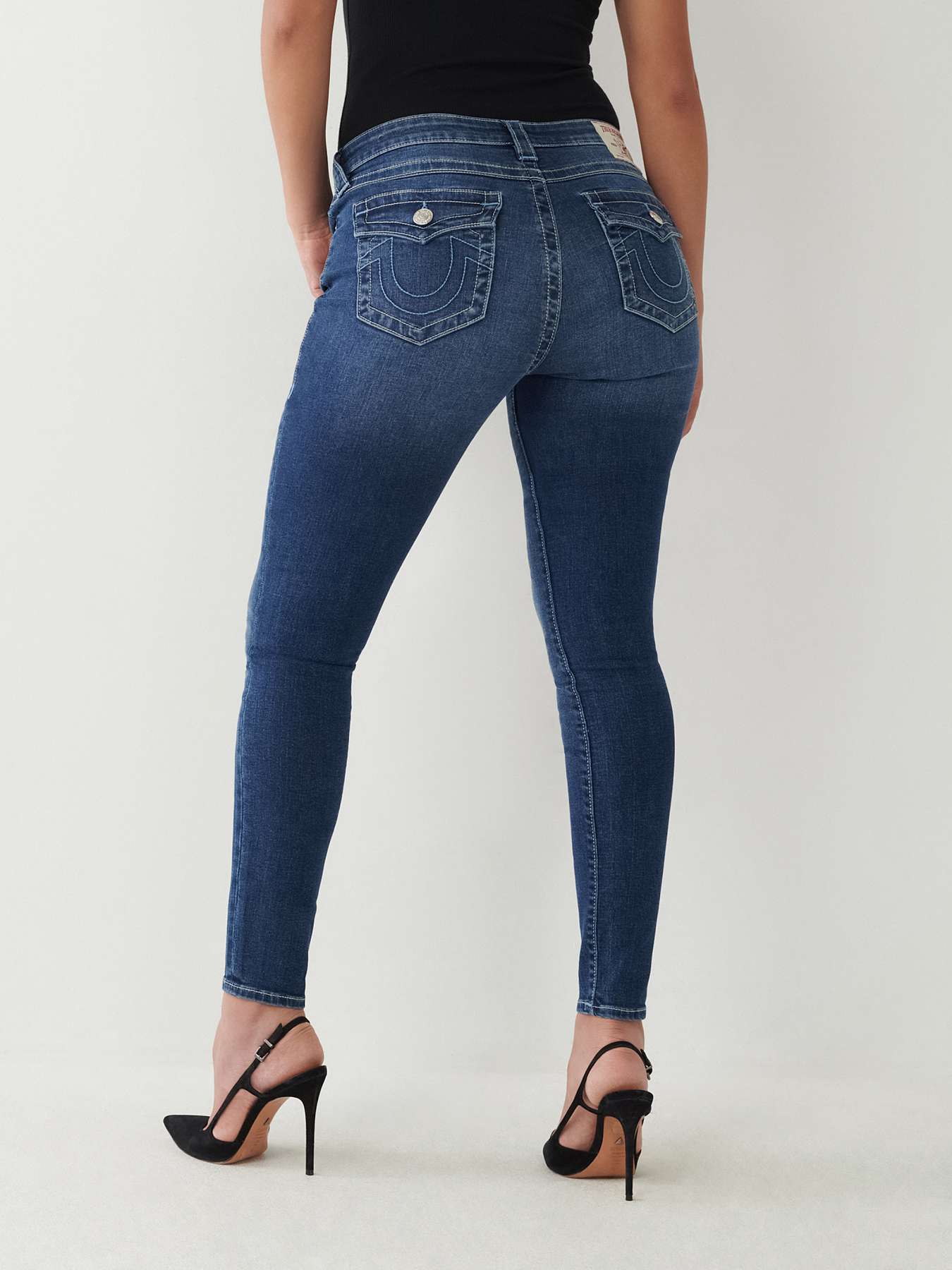JENNIE MID RISE CURVY SKINNY JEAN
