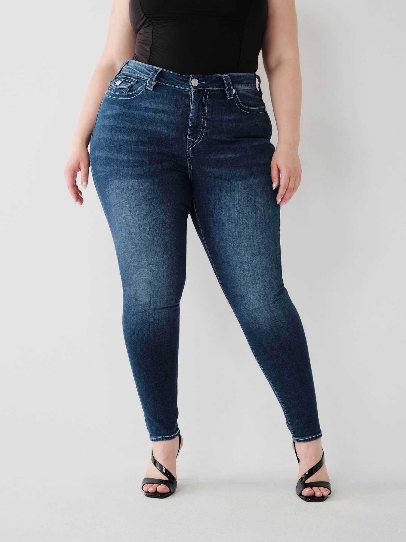 JENNIE MID RISE CURVY SKINNY JEAN
