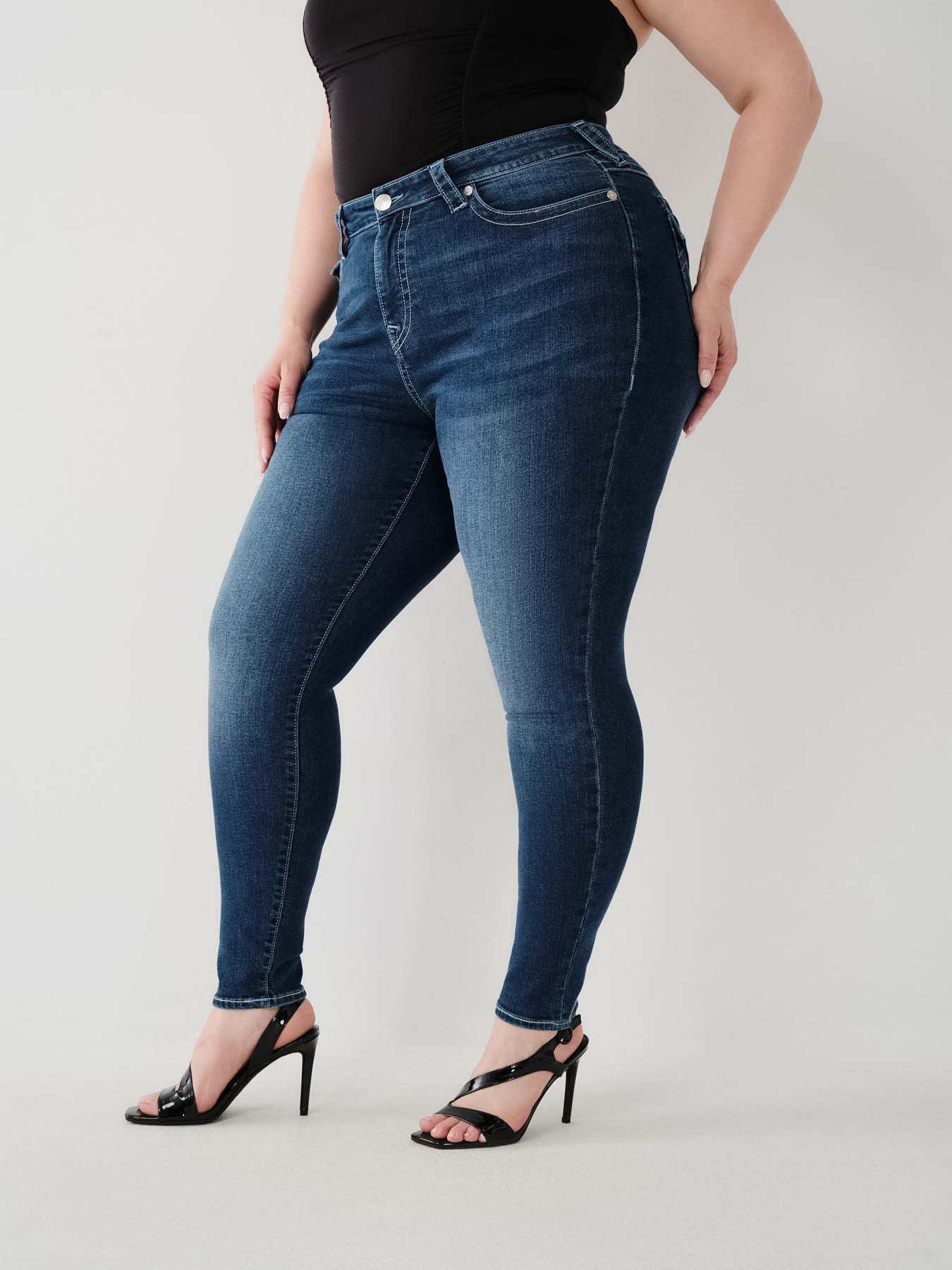 JENNIE MID RISE CURVY SKINNY JEAN