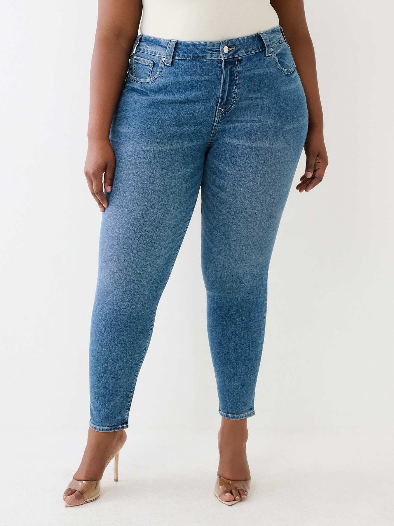 PLUS JENNIE MID RISE CURVY SKINNY JEAN