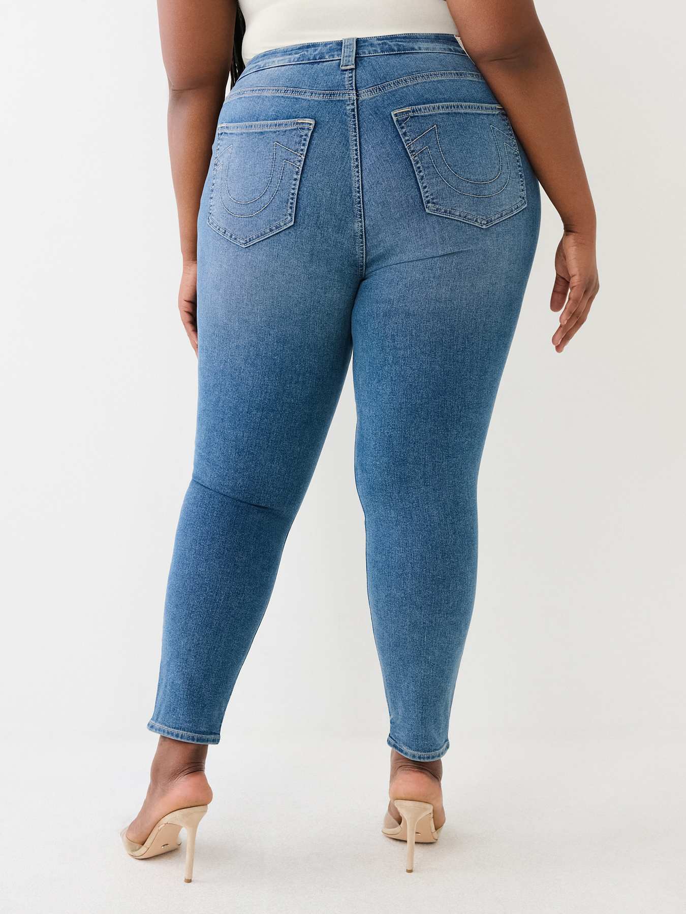 PLUS JENNIE MID RISE CURVY SKINNY JEAN
